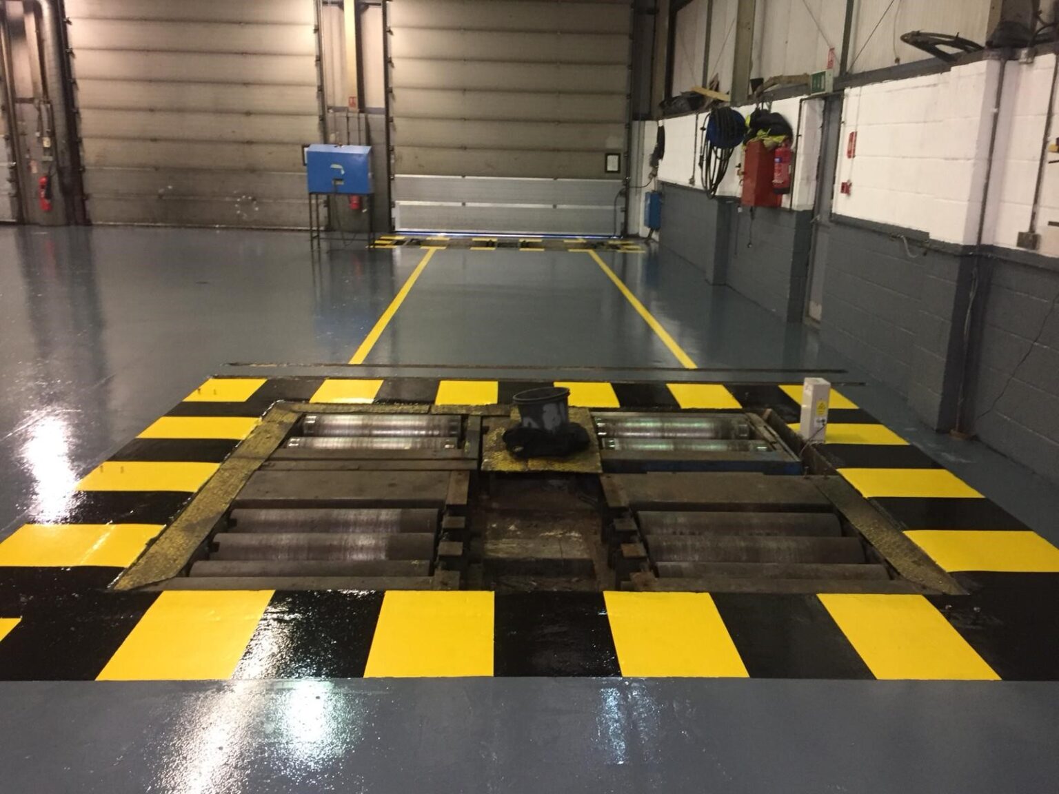 Demarcation lines around brake testing machine, Marshalls Coaches - IFC